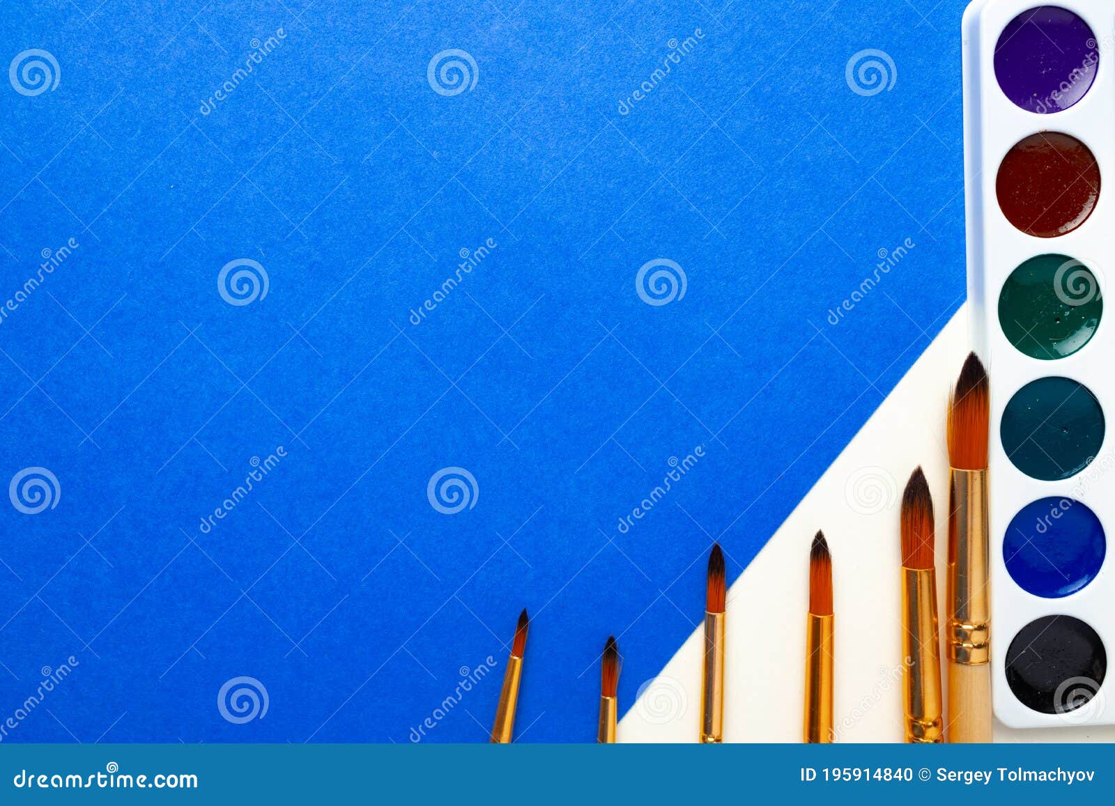Watercolor Paint Box and Set of Brushes on Blue and White Background ...