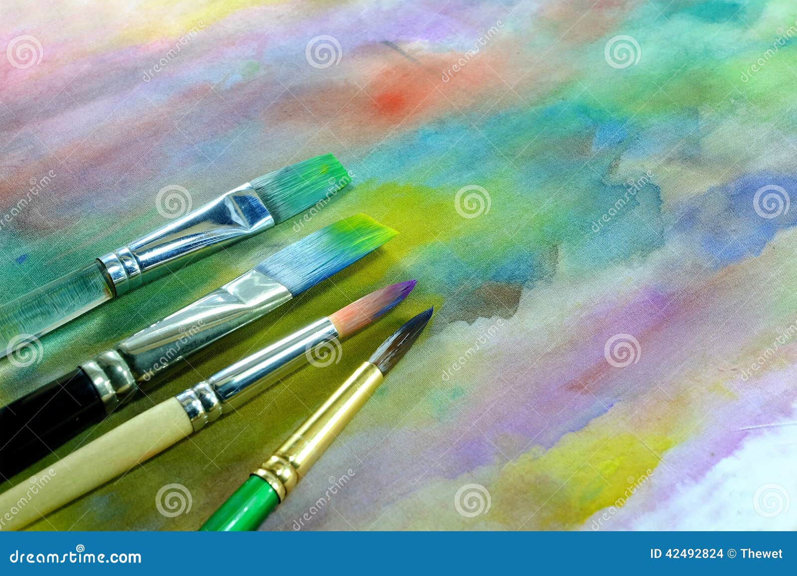 Watercolor paint brushes stock photo. Image of stain - 42492824