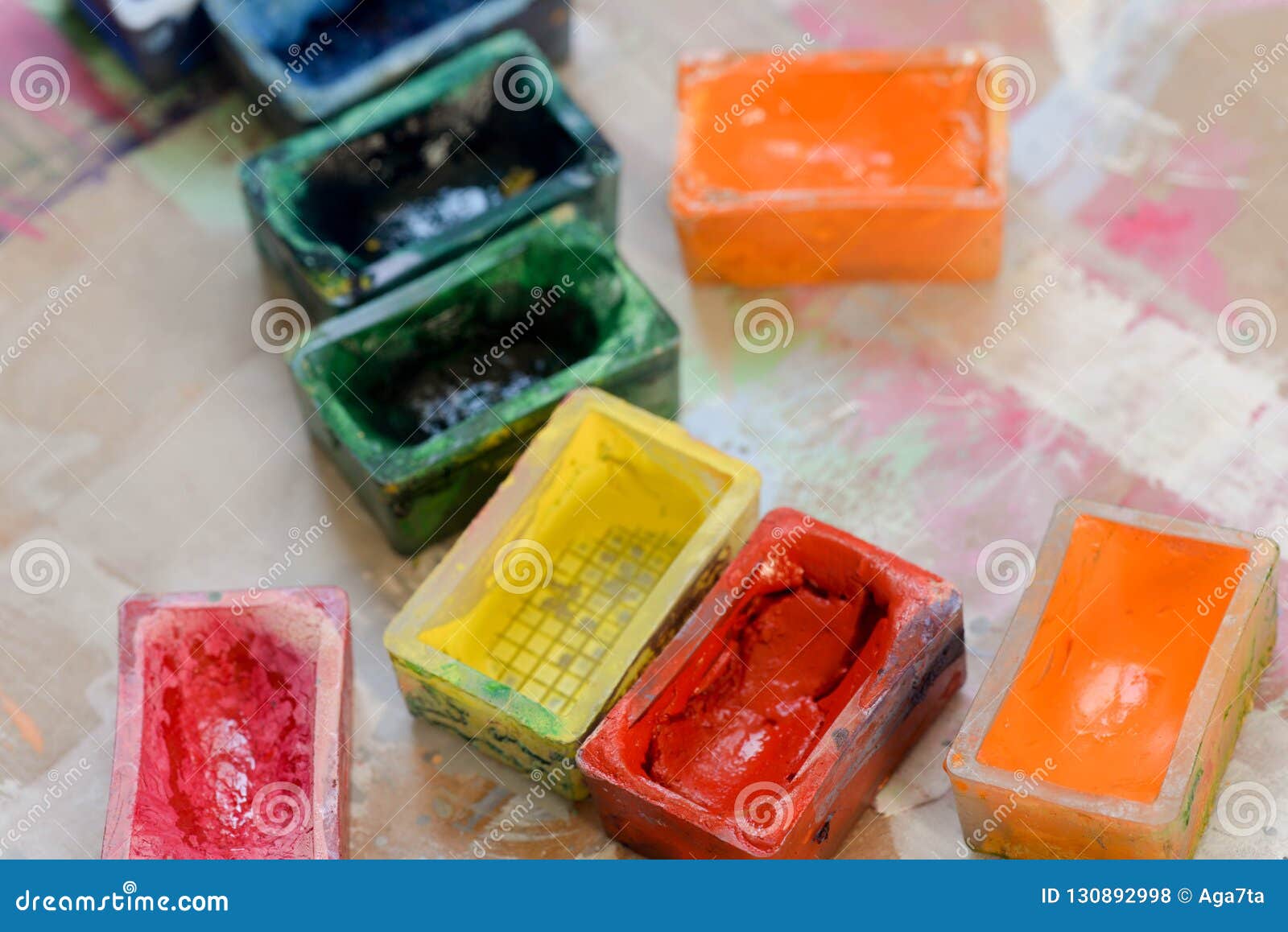 Watercolor Paints in Boxes on Painted Paper Stock Photo - Image of ...