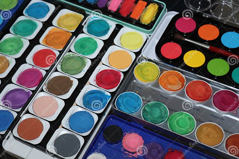 Watercolors in boxes stock photo. Image of paintbrush - 221607916
