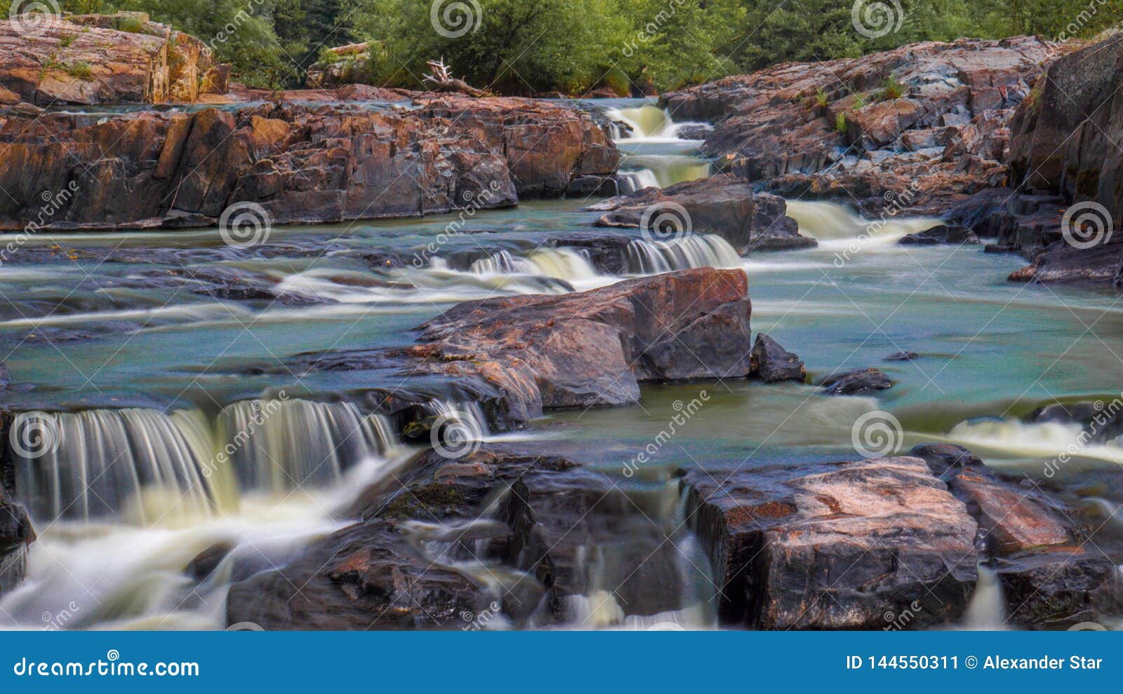 Colorful Waterfall Rocky Quarry Surrounded by Green Tries and Painted ...