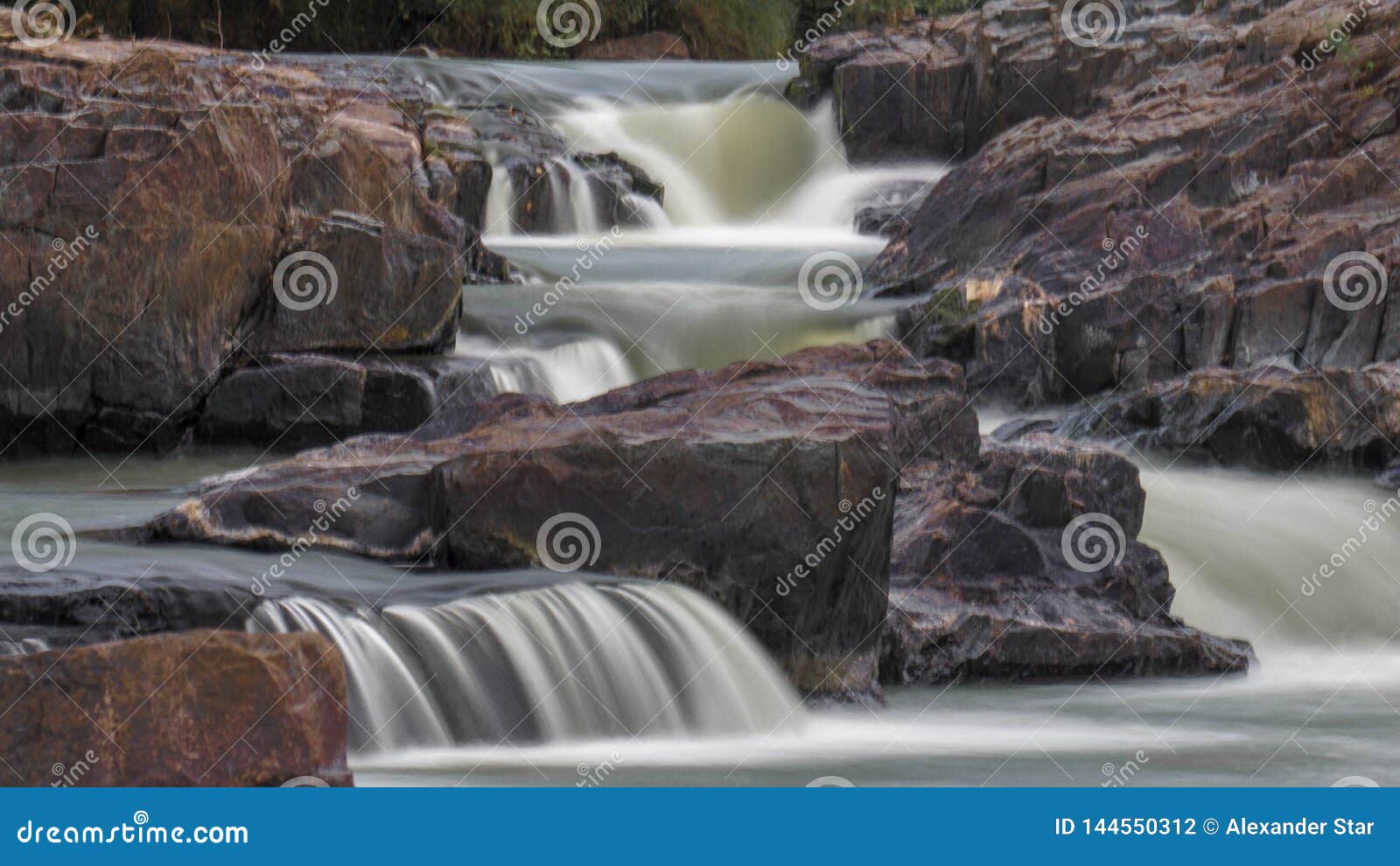 Colorful Waterfall Rocky Quarry Surrounded by Green Tries and Painted ...