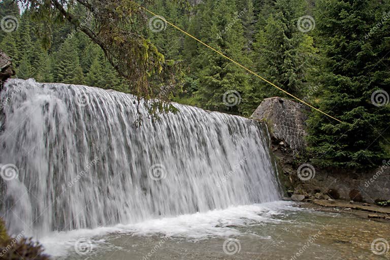 Created Waterfall and a Cable Over it Stock Photo - Image of fall ...