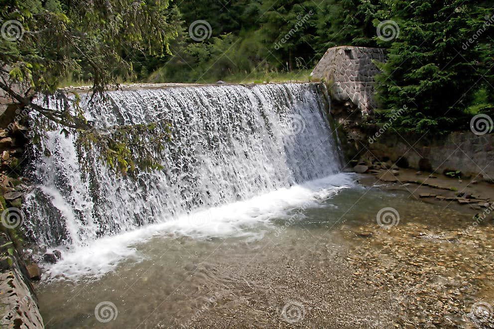 Created Waterfall and a Cable Over it Stock Photo - Image of cascade ...