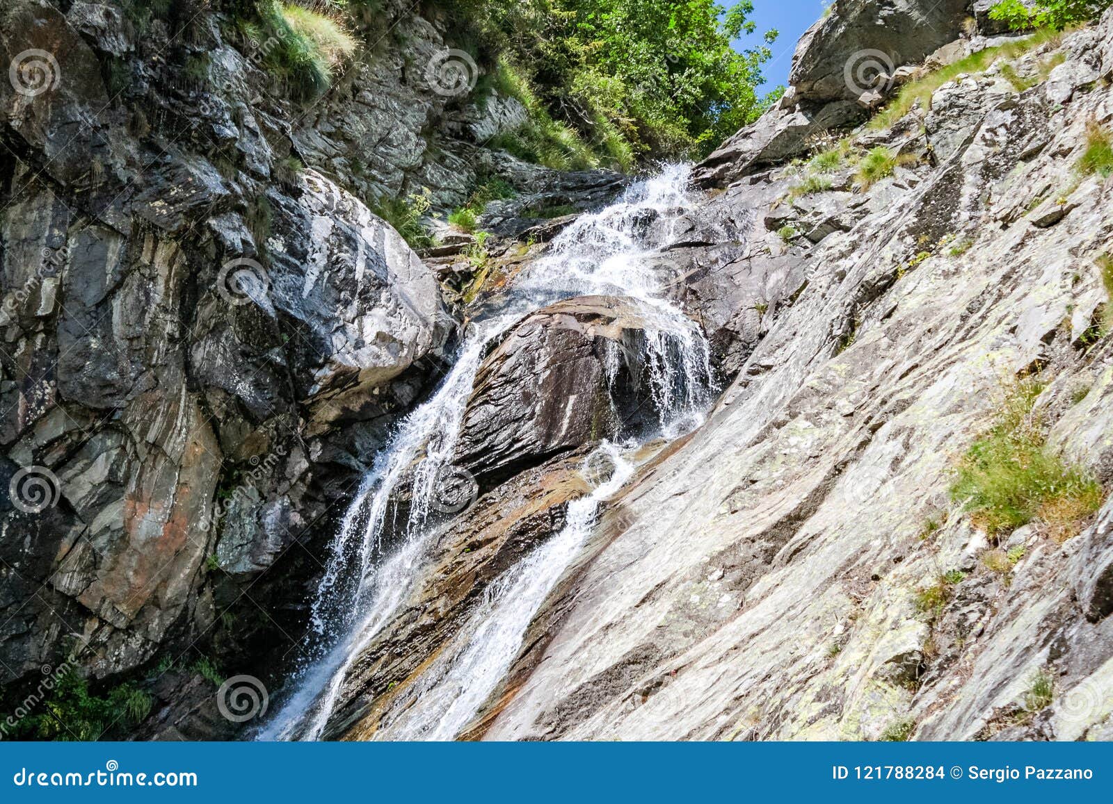 Waterfall in an Alpine Valley Stock Photo - Image of champoluc ...