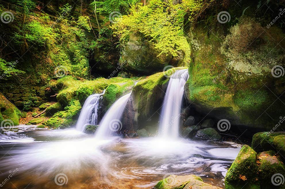 Waterfall in autumn forest stock image. Image of motion - 45265619
