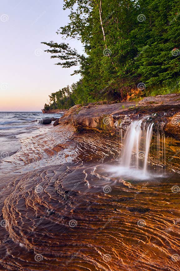 Waterfall at the beach. stock image. Image of freshness - 20144549