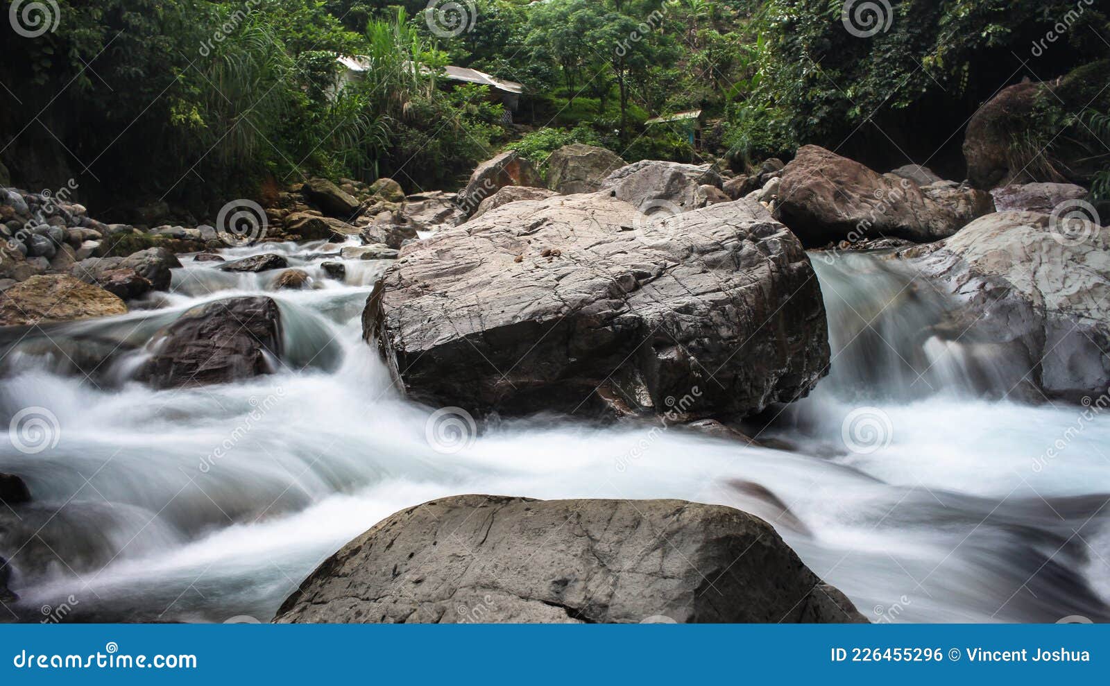 Waterfall with big rock stock photo. Image of rock, geology - 226455296