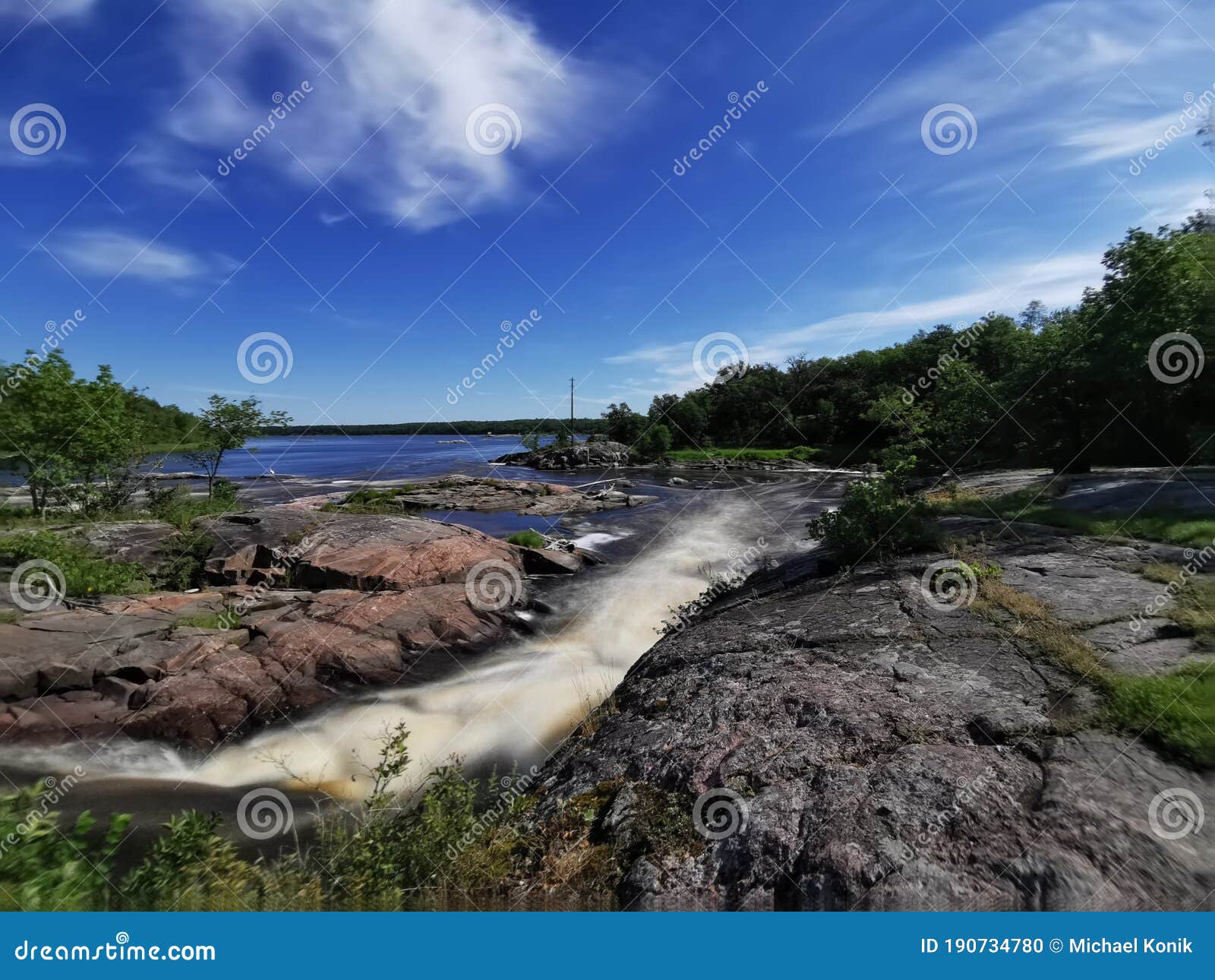Waterfall And A Blue Pool With Fish Royalty-Free Stock Image ...