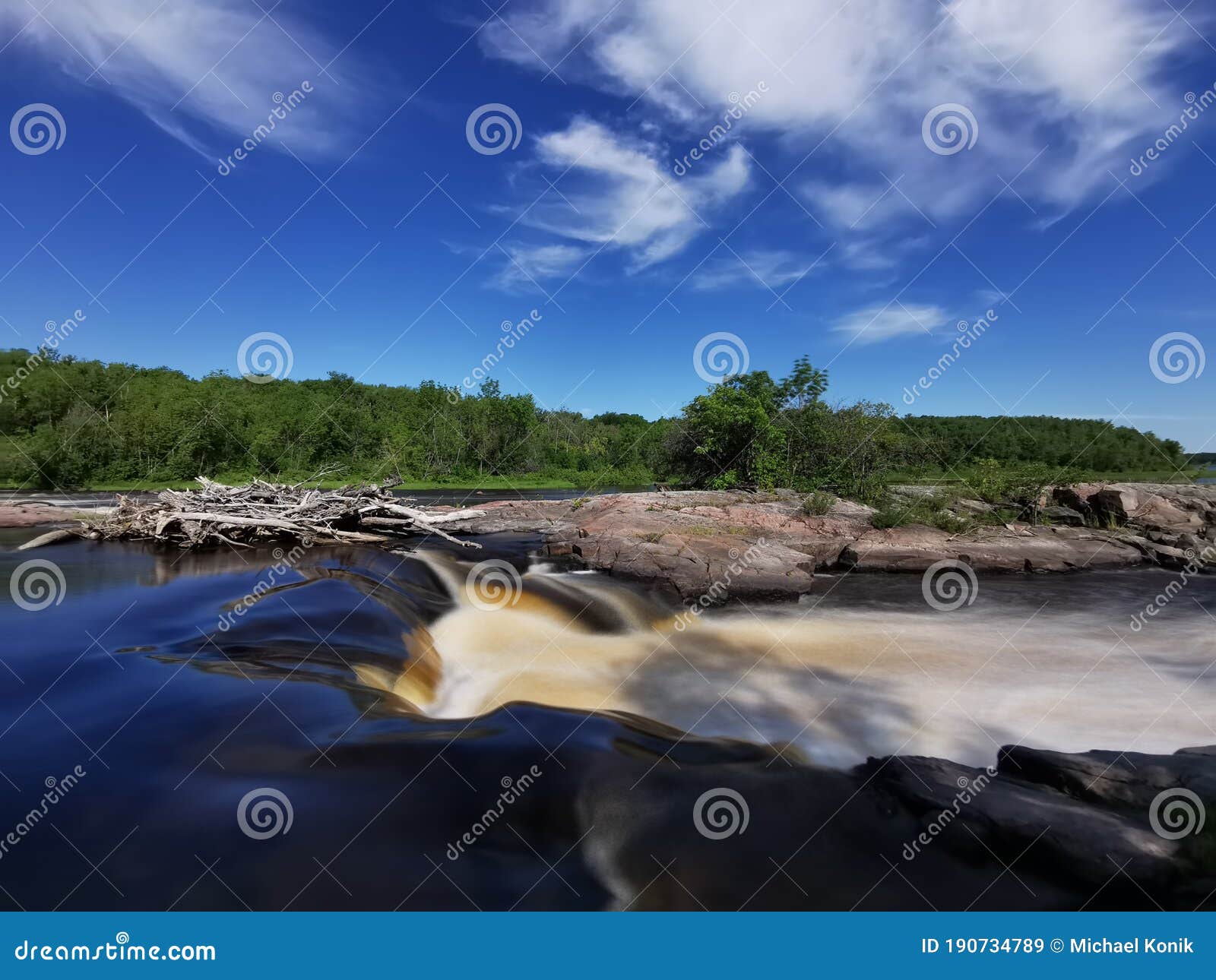 Waterfall Blue Sky Clouds Streaming Water Stock Image - Image of clouds ...