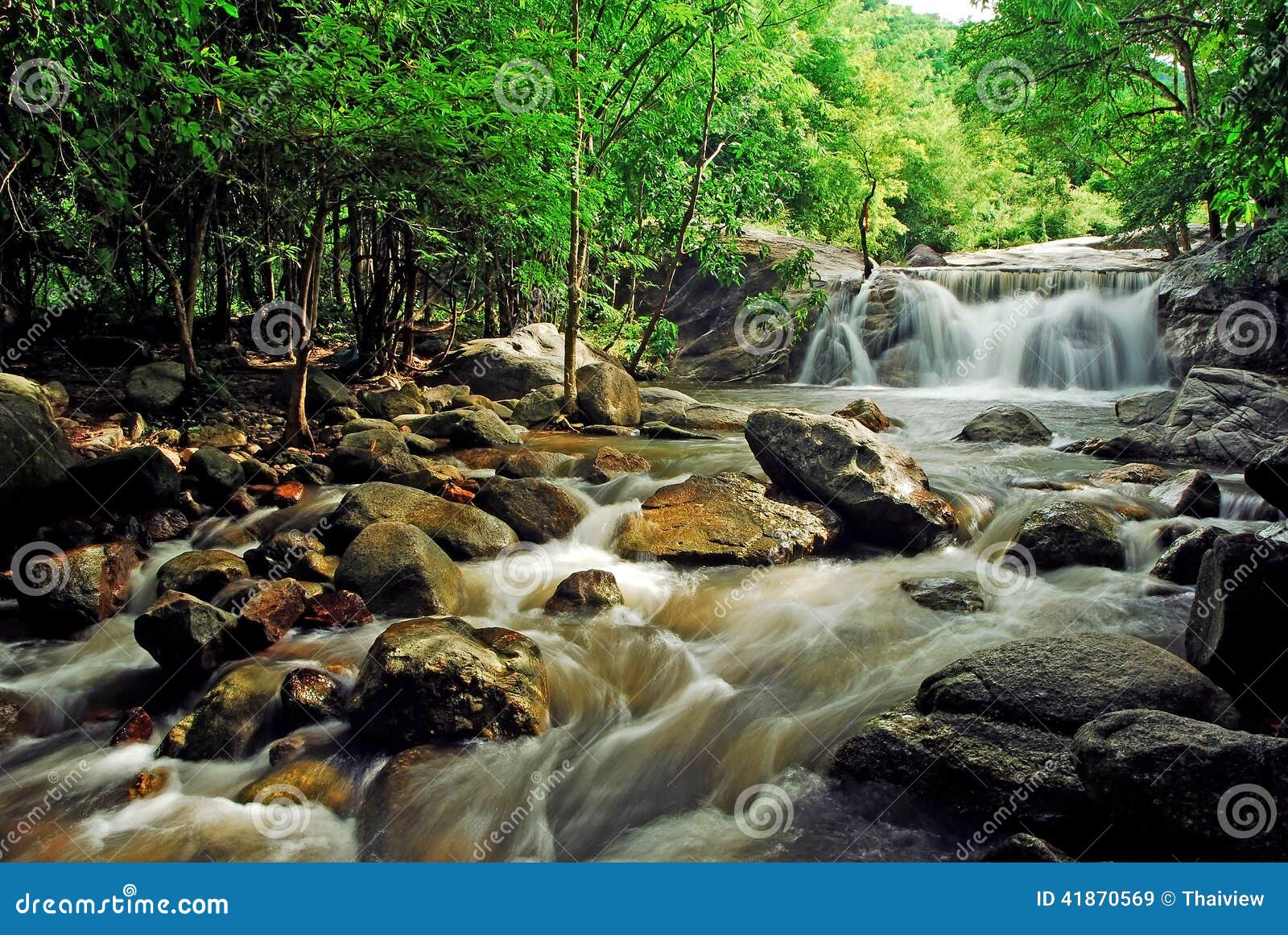 Waterfall with blue stream stock image. Image of background - 41870569