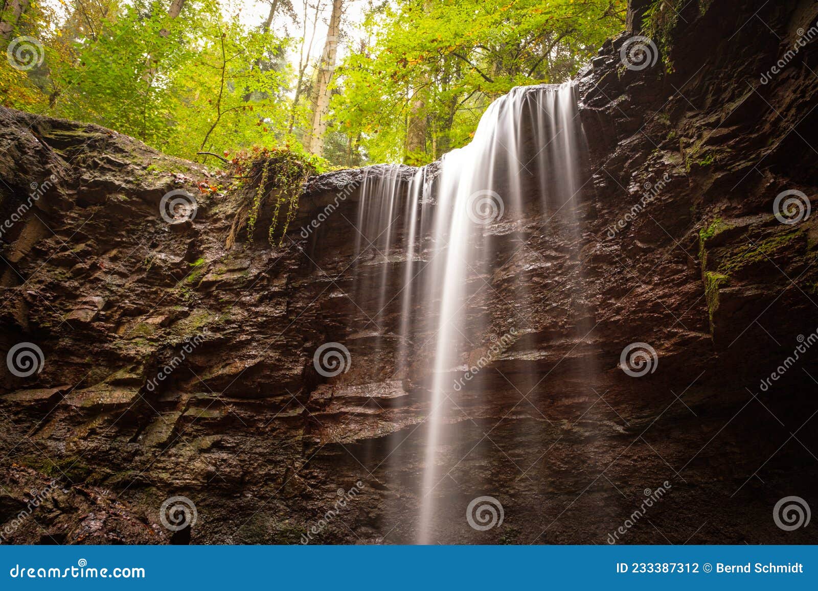Waterfall Cascade is Flowing Over a Rock Stock Photo - Image of scenic ...