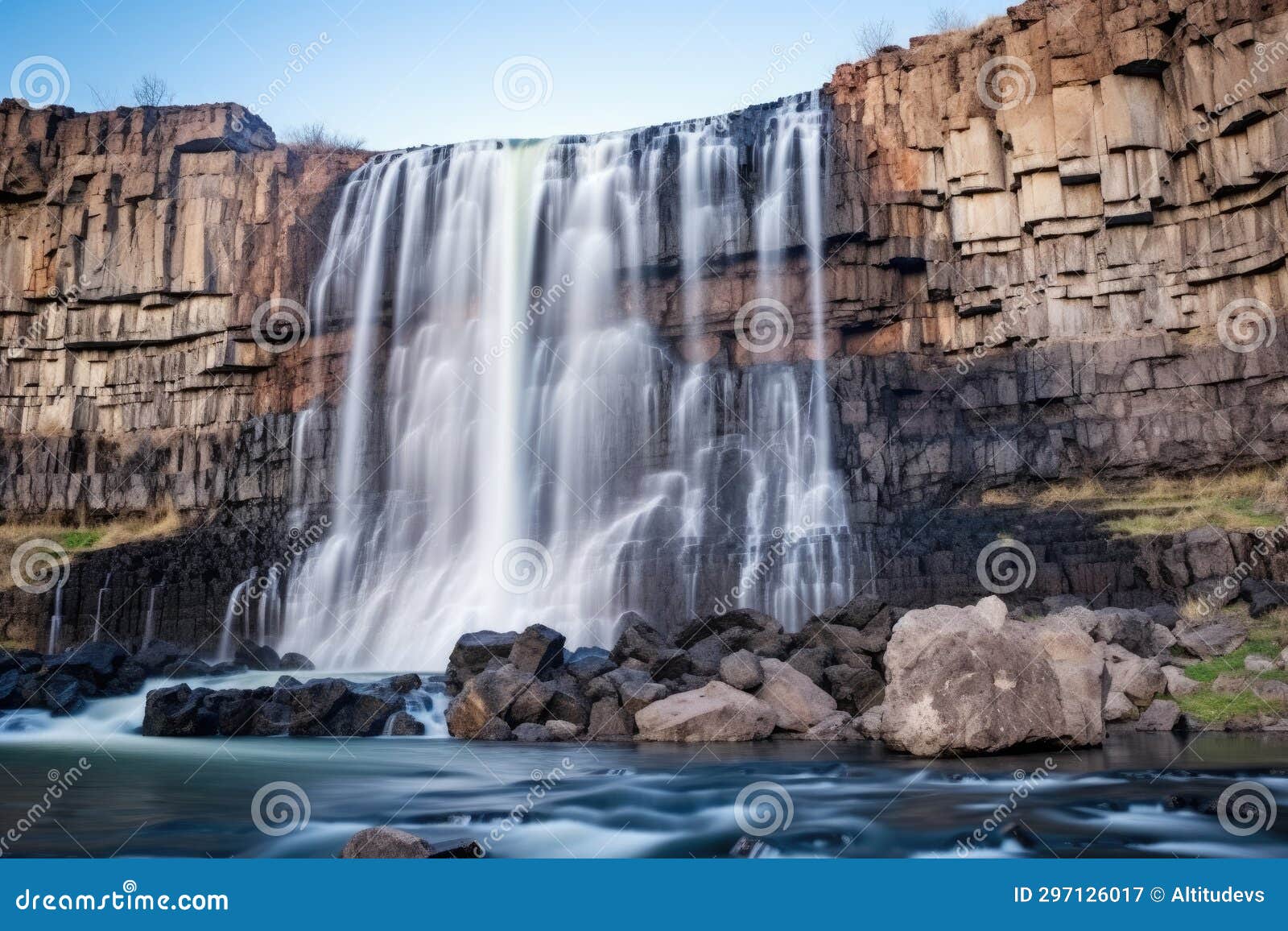 Waterfall Cascading Over Rocky Cliffs Stock Image - Image of rocky ...