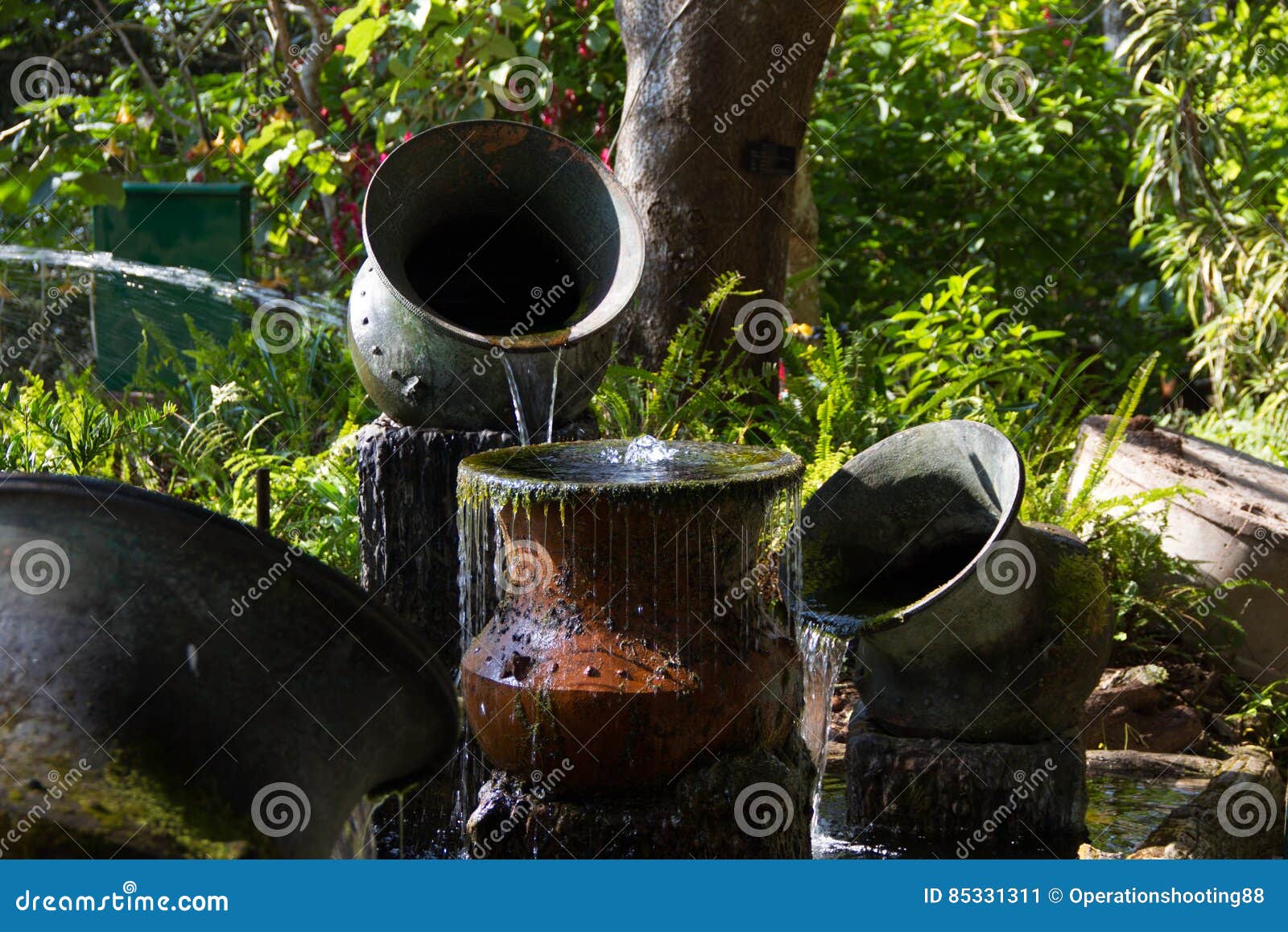 Waterfall from clay jar stock image. Image of landscape - 85331311