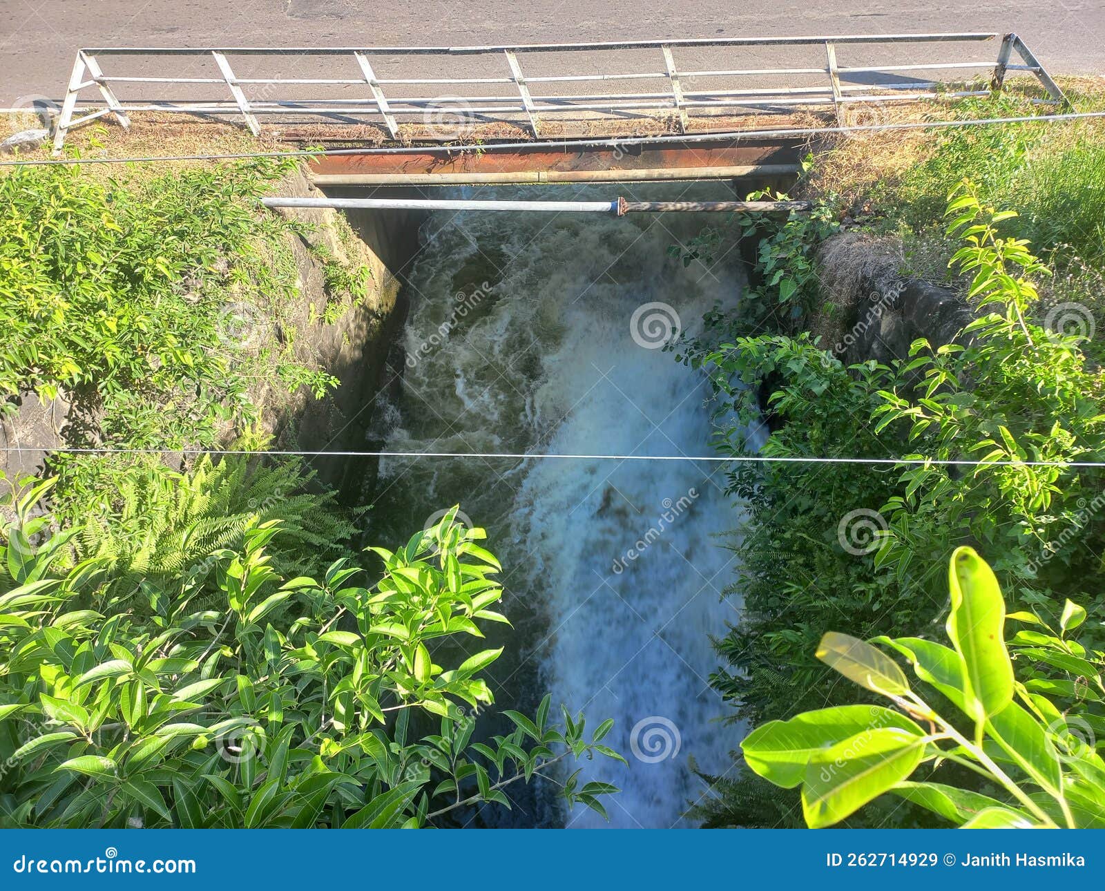 A Small Waterfall Near the Busy Road Stock Image - Image of small ...
