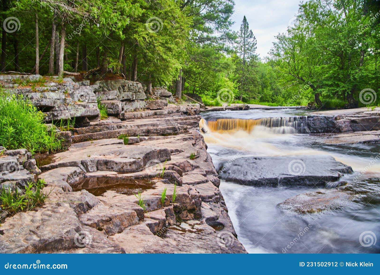 Waterfall Creating Small Gorge with Tiers of Grey Rocks in Forest Stock ...