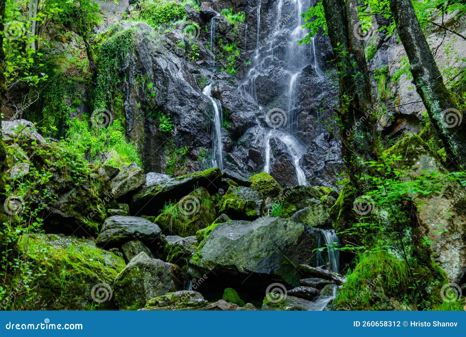 Waterfall in Deep Mountain with Large Rocks in Spring Stock Photo ...