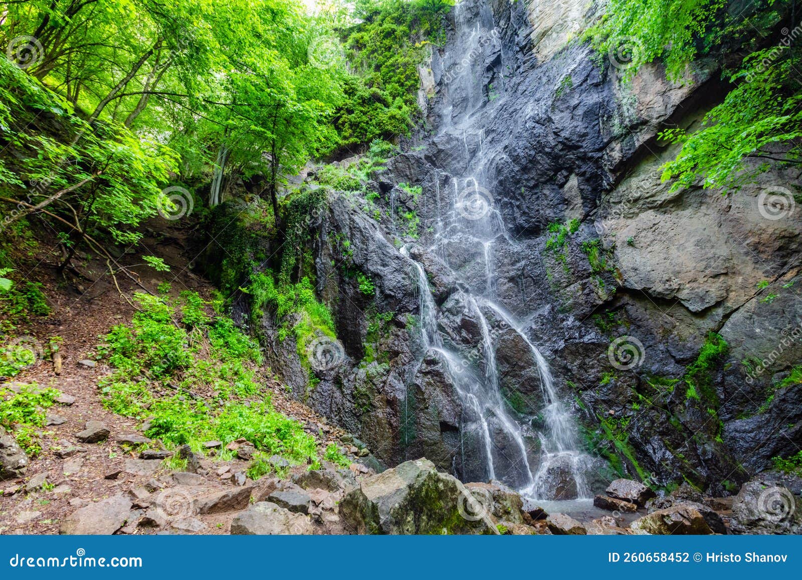 Waterfall in Deep Mountain with Large Rocks in Spring Stock Photo ...