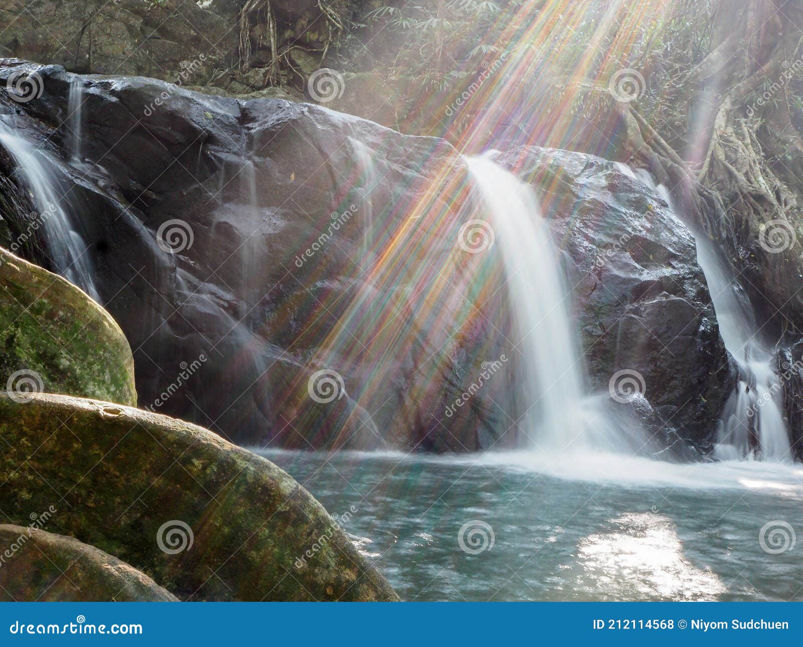 Waterfall with the Diffuse Light in Rainbow Colors Stock Photo - Image ...