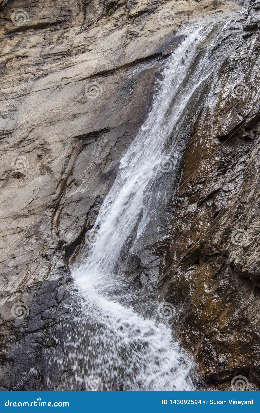 Waterfall Down Sheer Rock Cliff Hitting Obstruction and Spraying ...
