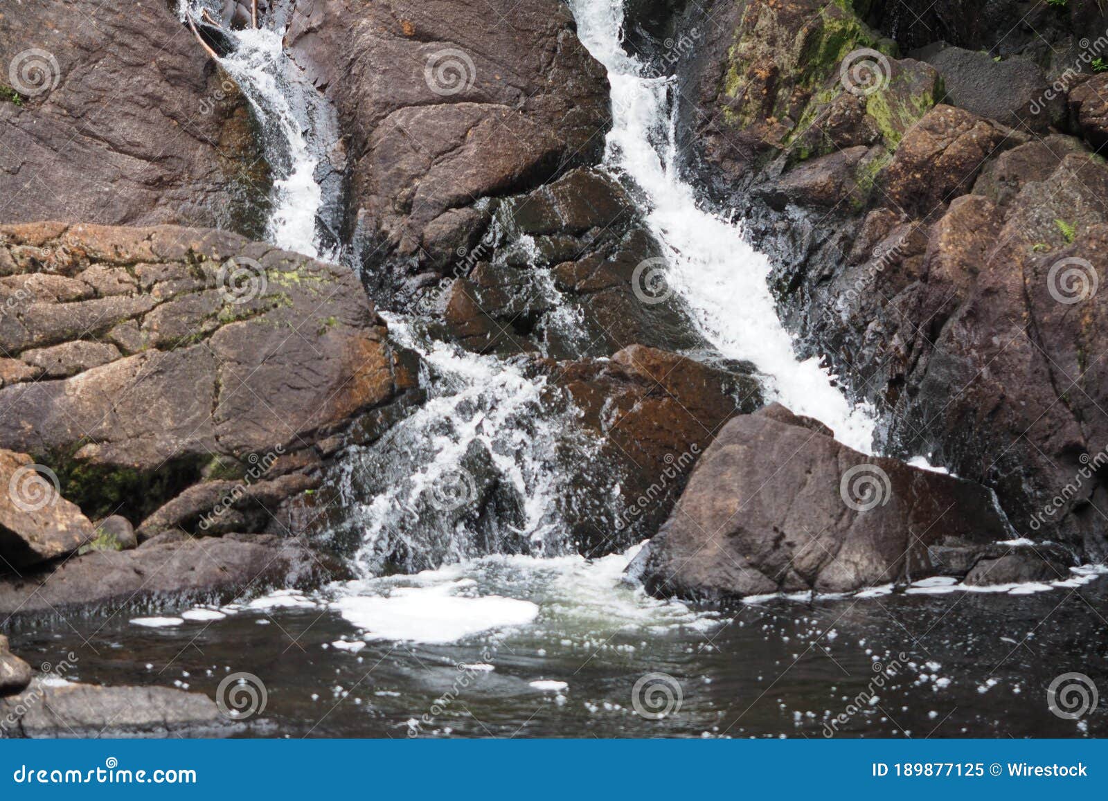 Waterfall Falling into a Lake with Stones Covered with Moss in Halifax ...