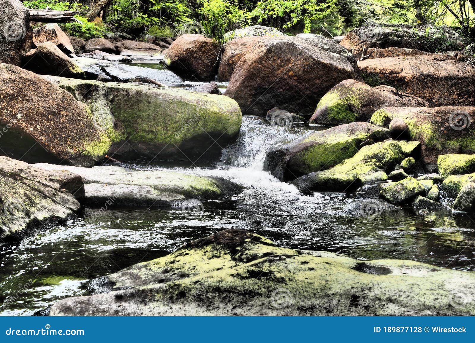 Waterfall Falling into a Lake with Stones Covered with Moss in Halifax ...