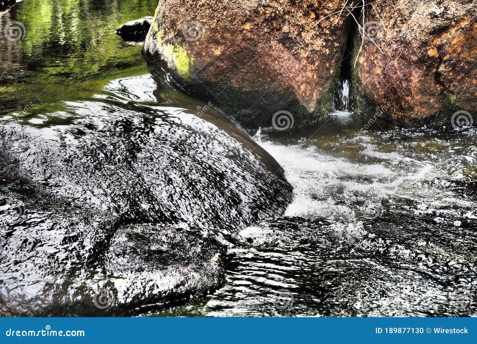 Waterfall Falling into a Lake with Stones Covered with Moss in Halifax ...