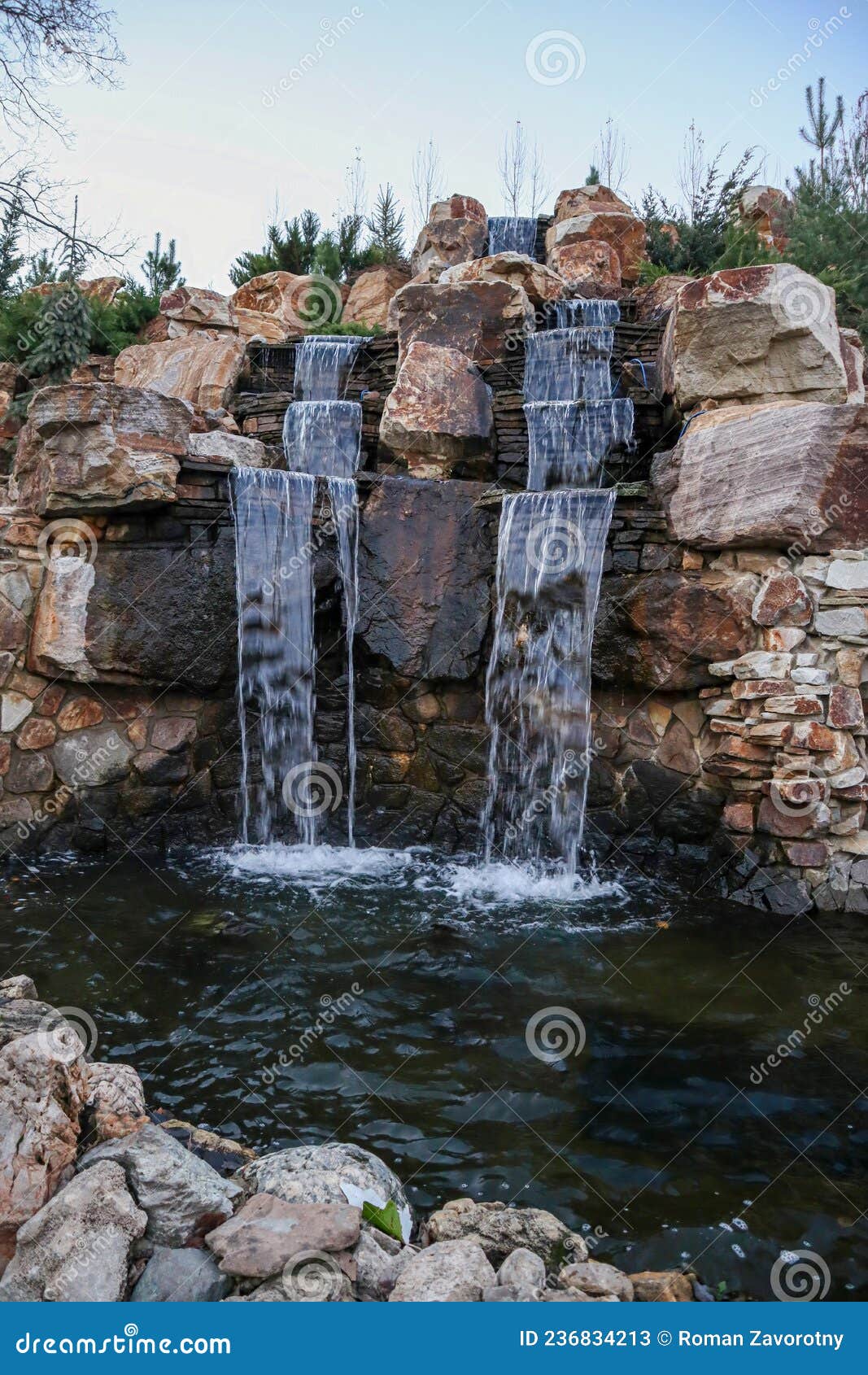 Waterfall Flowing Down from a Cliff Close-up. Vertical Photo Stock ...