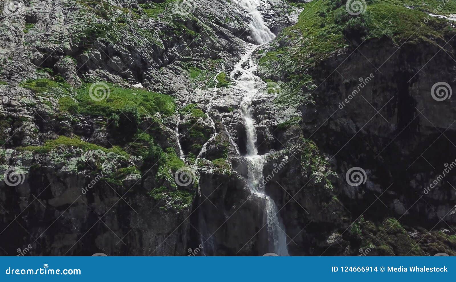 Waterfall Flowing Down from High Mountains on a Sunny Day. Top View of ...