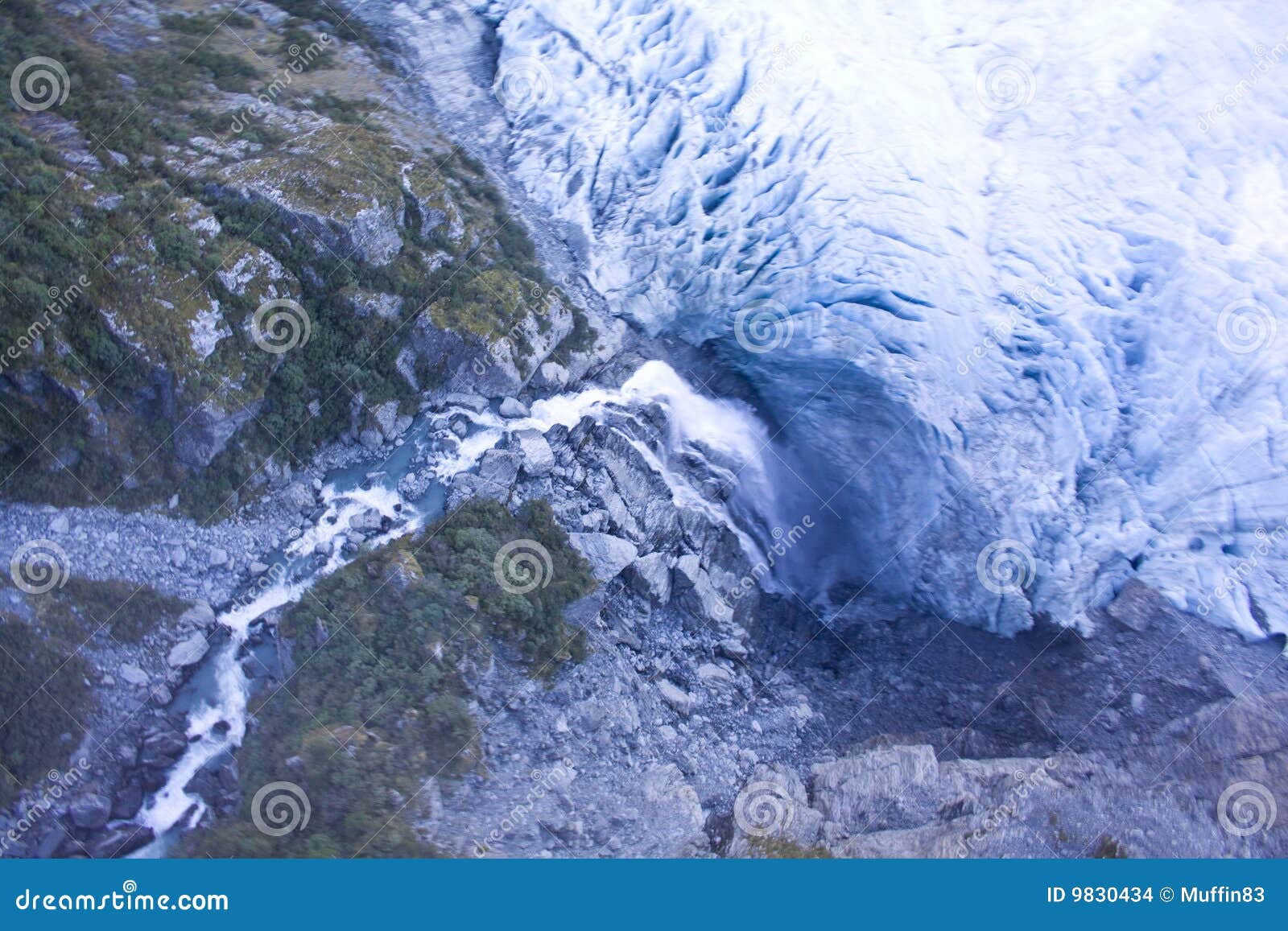 Waterfall Flowing Under a Glacier Stock Photo - Image of glaciers ...