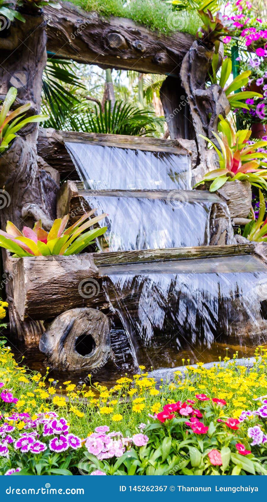 Waterfall Flows in Cozy Home Flower Garden Stock Image - Image of ...