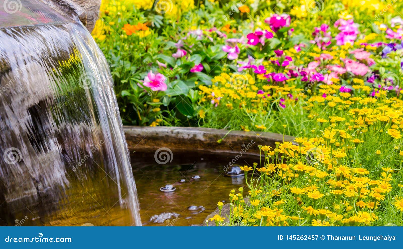 Waterfall Flows in Cozy Home Flower Garden Stock Image - Image of ...