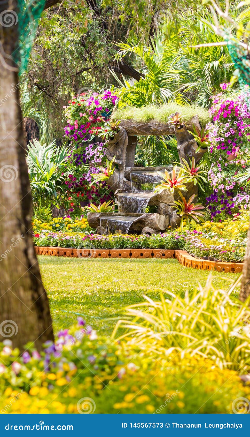 Waterfall Flows in Cozy Home Flower Garden Stock Image - Image of ...