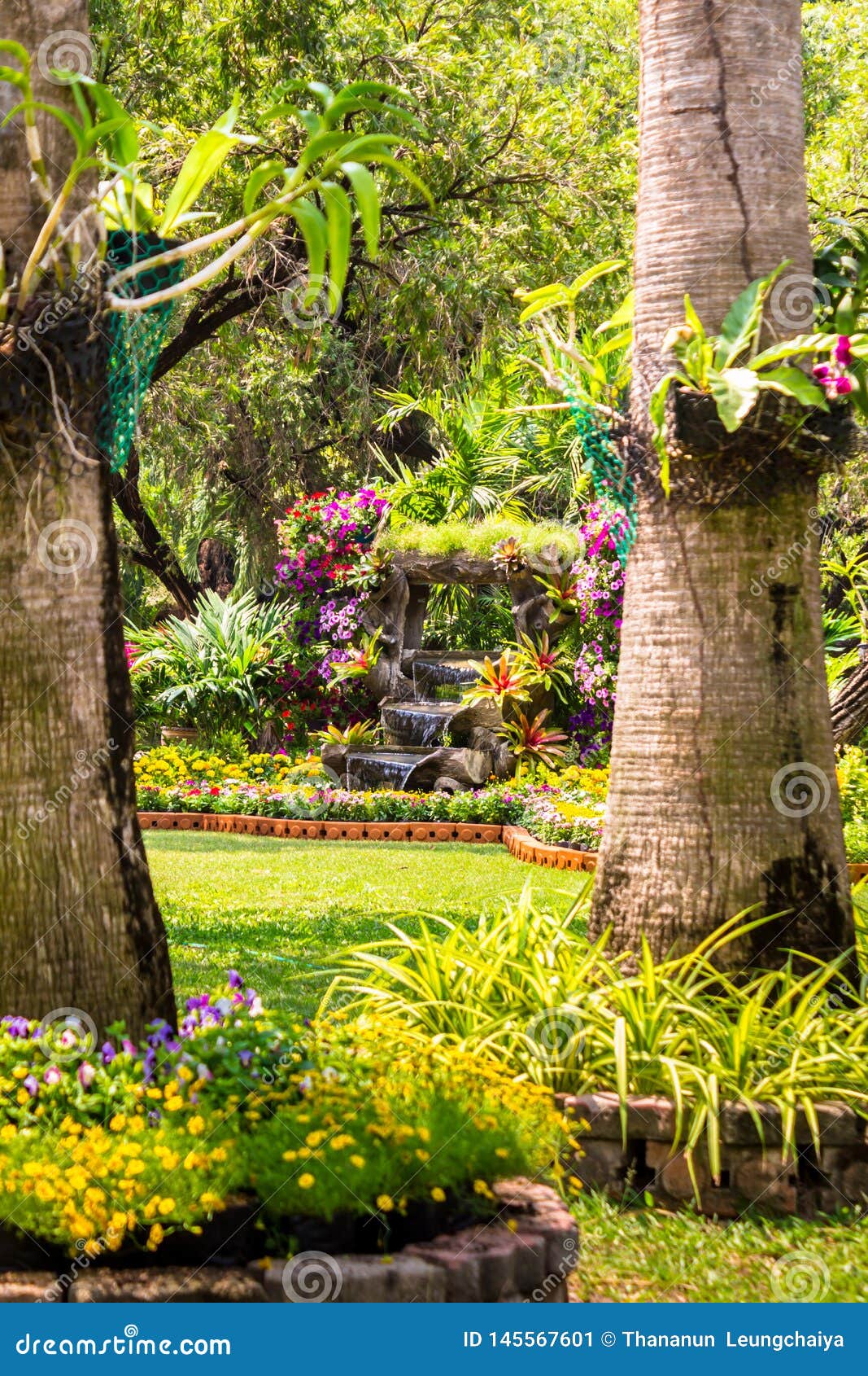 Waterfall Flows in Cozy Home Flower Garden Stock Image - Image of ...
