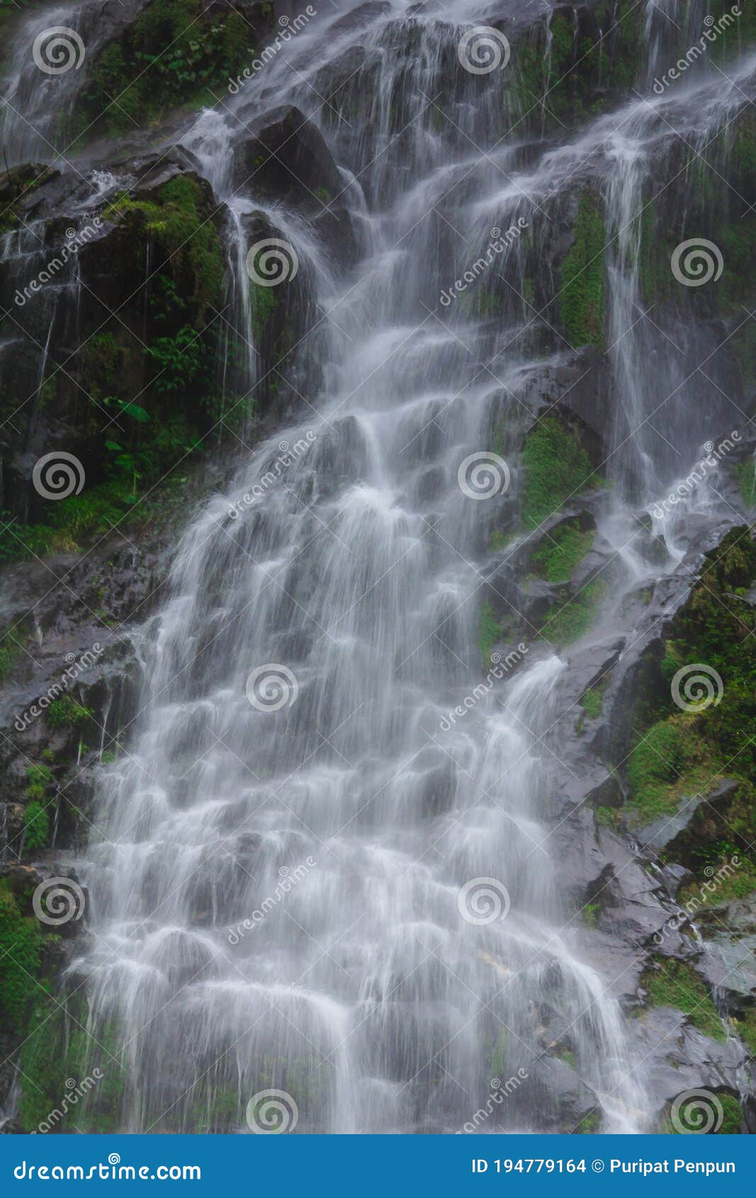 Waterfall Flows Down the Long Line of Cliffs Stock Photo - Image of ...