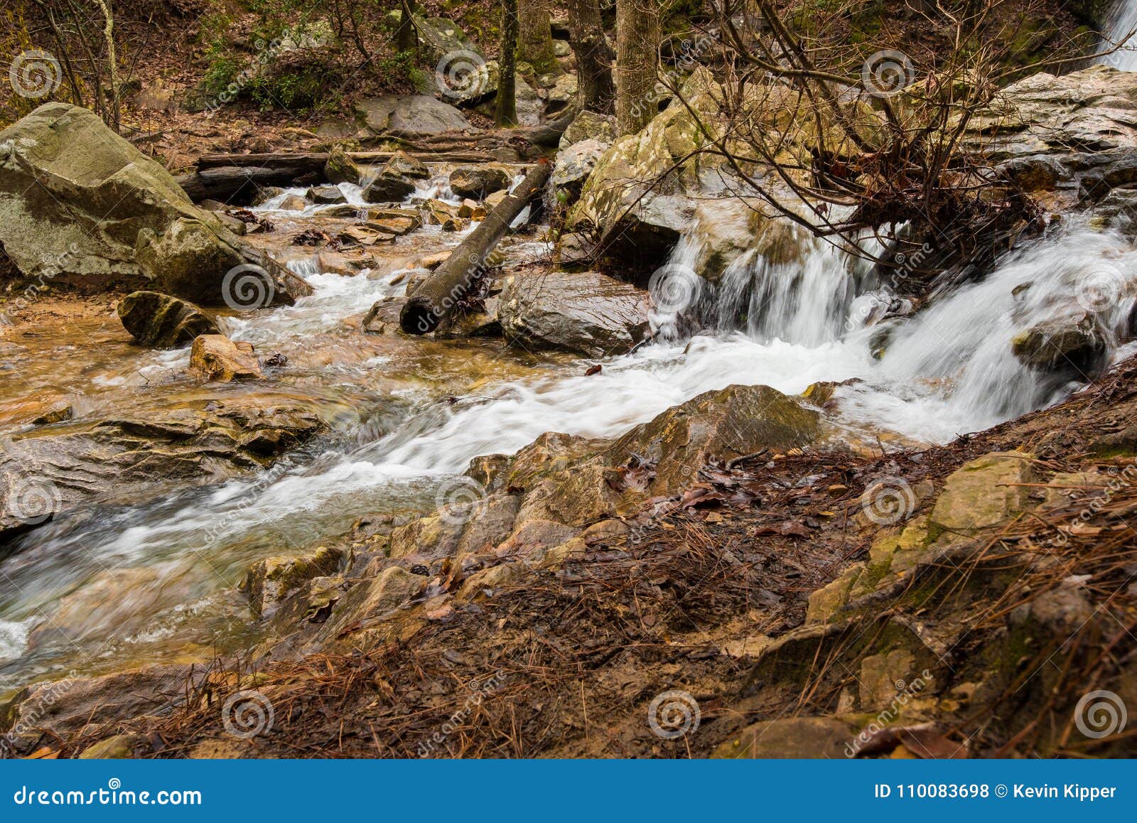 A Waterfall Flows after a Rain in a Hidden Canyon on a Mountain Stock ...