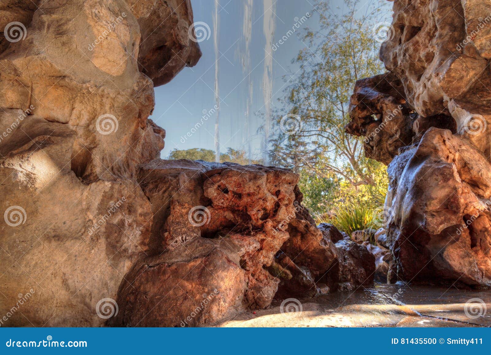 Waterfall Flows Over a Manmade Rock Stock Photo - Image of manmade ...