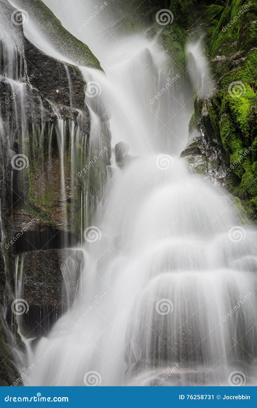Waterfall Flows In Streams Into Granite Bed. Fountain In Form Of Huge ...