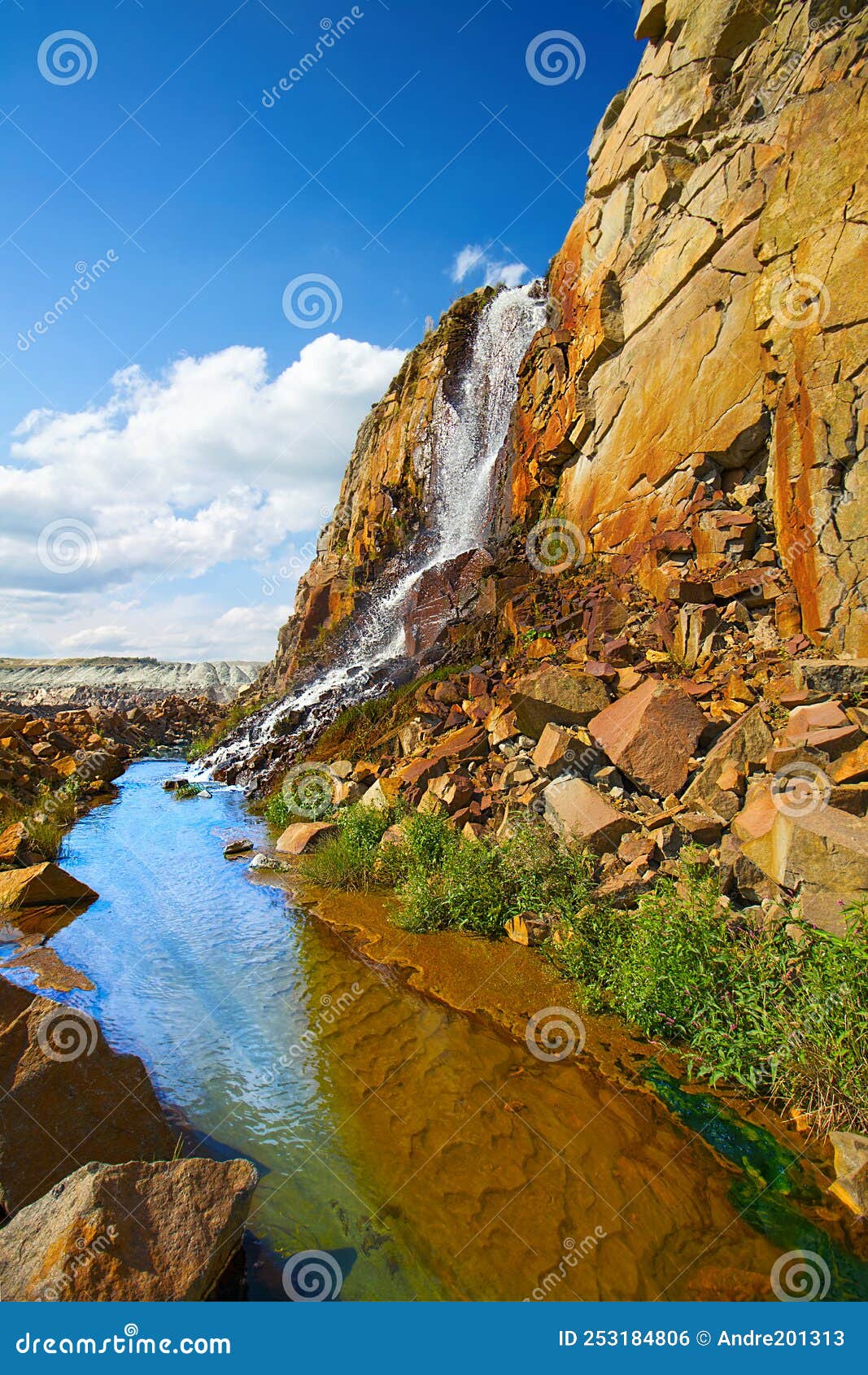 Waterfall in a Granite Quarry, Landscape with Red Stones and Blue Sky ...