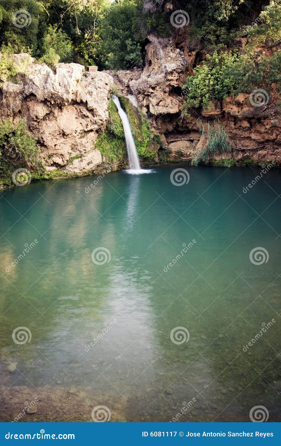 Waterfall on lake stock image. Image of colorful, ferny - 6081117