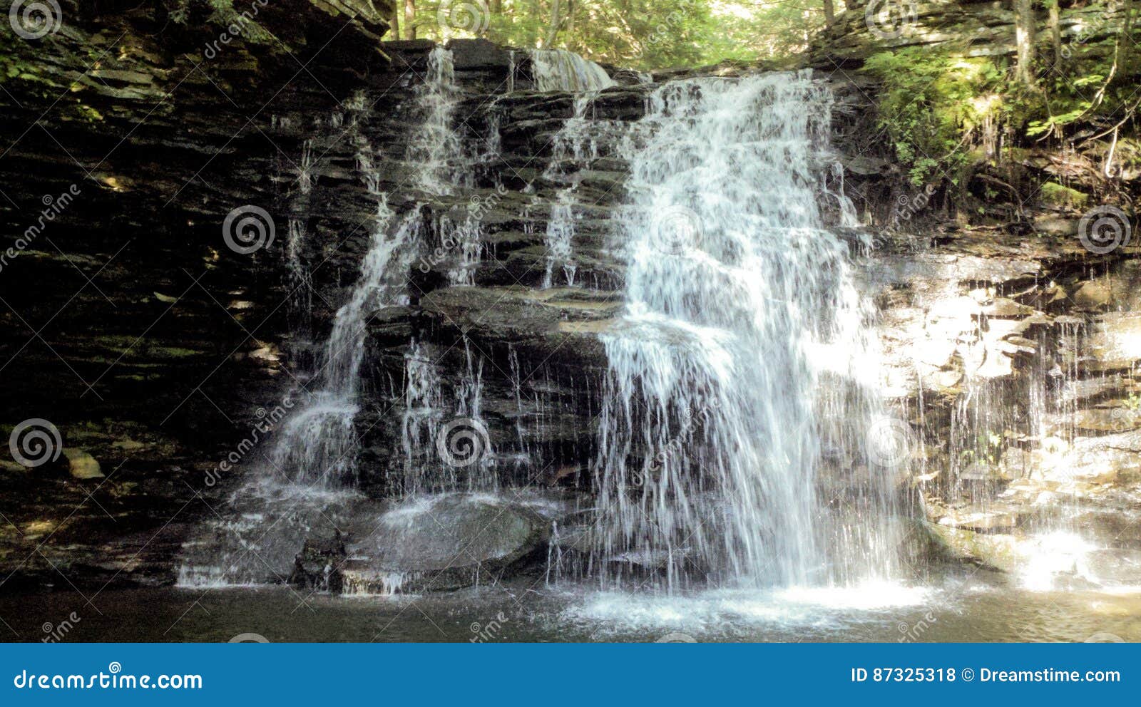 Waterfall light and shadow stock photo. Image of nature - 87325318