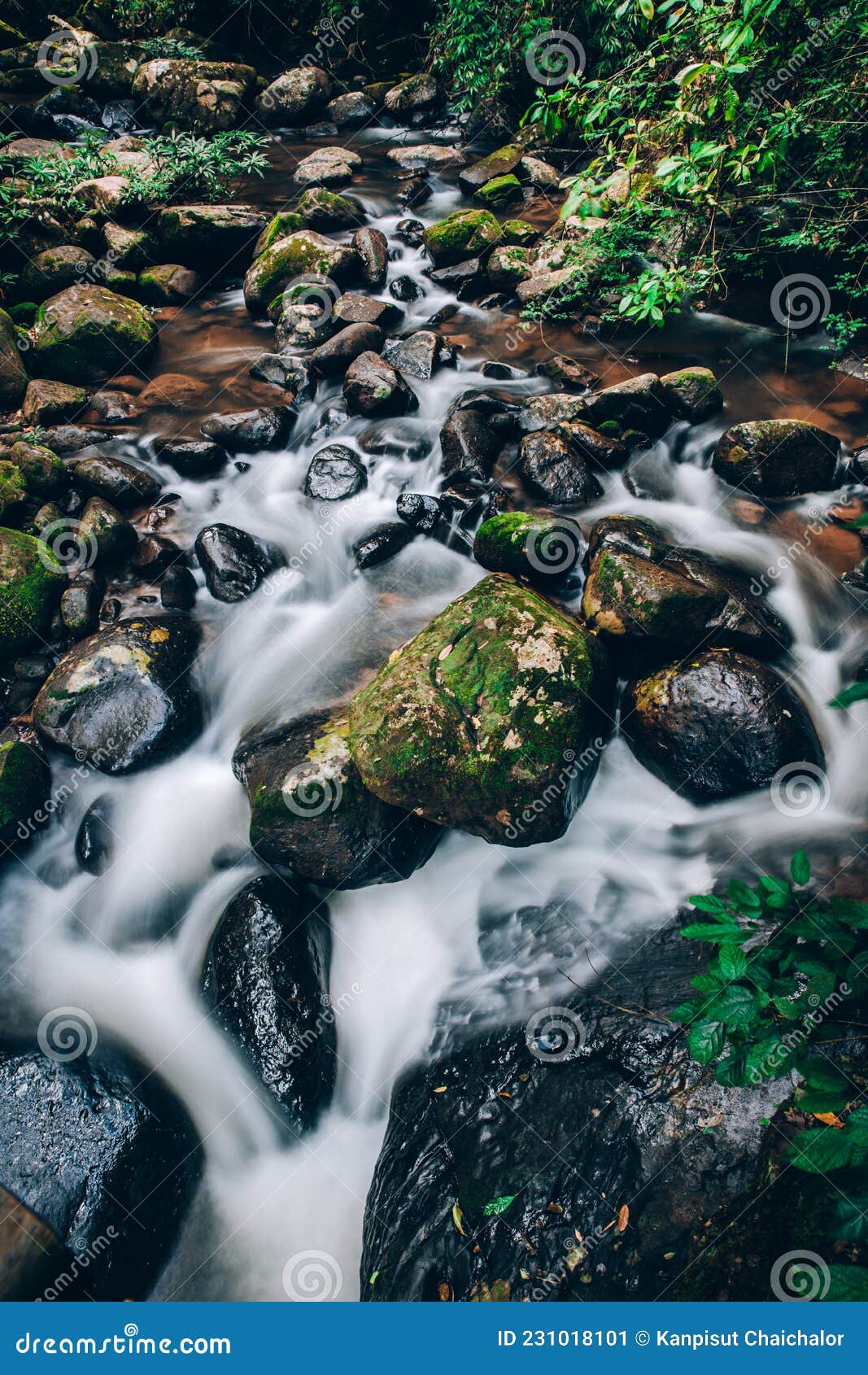 Waterfall Located in the Forest of Thailand. the Water Flows Over a ...