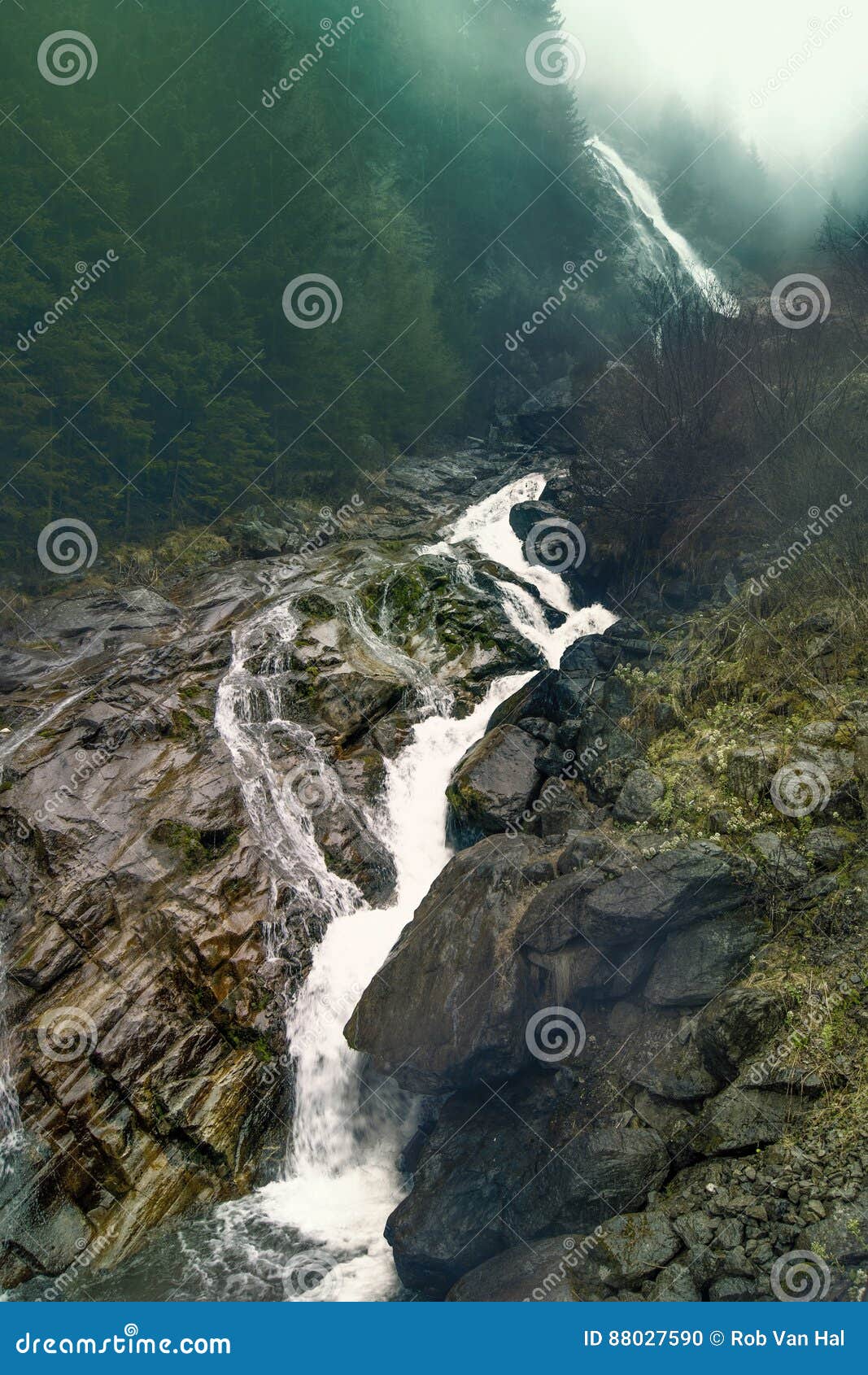 Waterfall in the mist stock photo. Image of scenery, adventure - 88027590