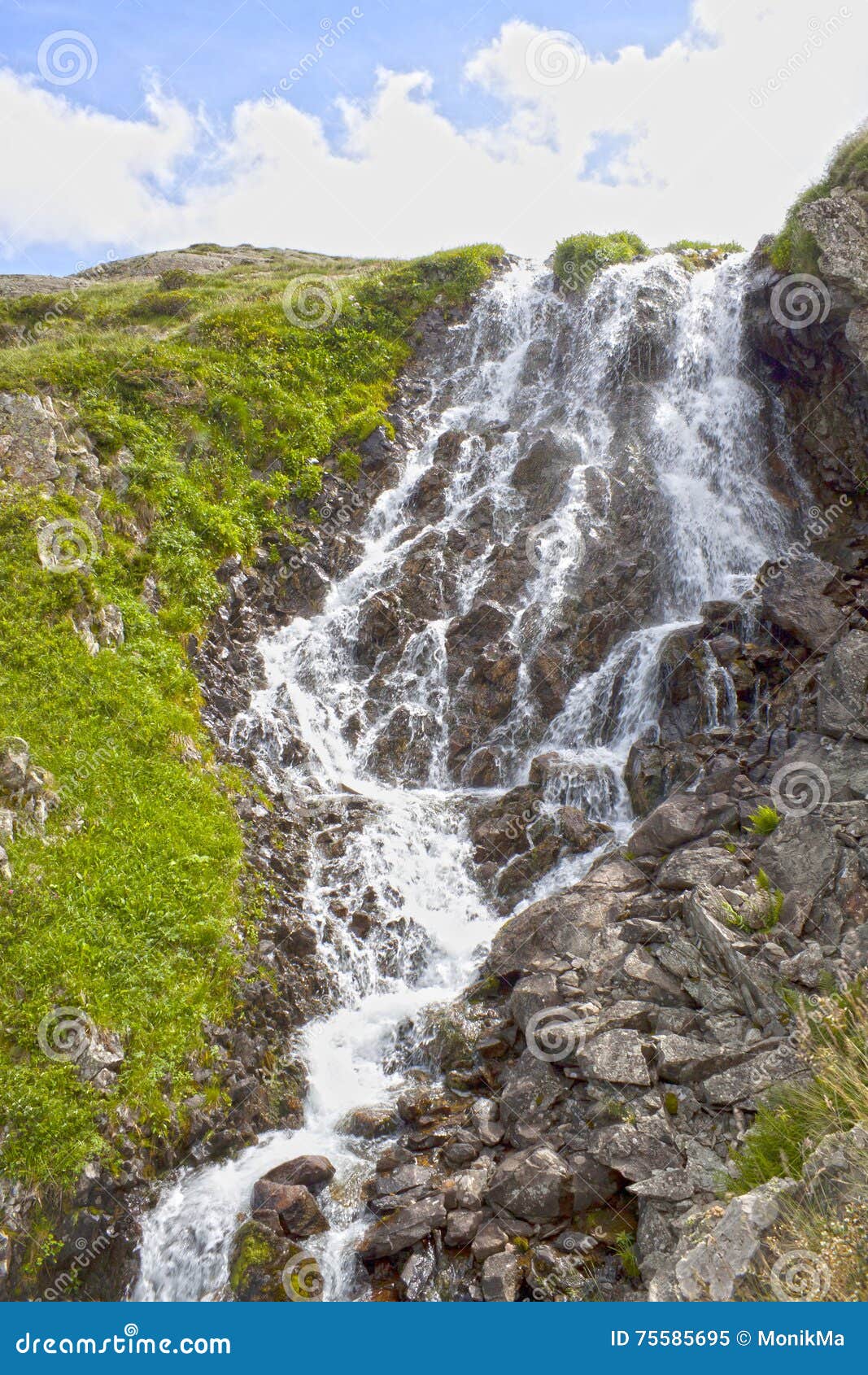 Waterfall in a Mountain with a Cloudy Sky Stock Image - Image of stream ...