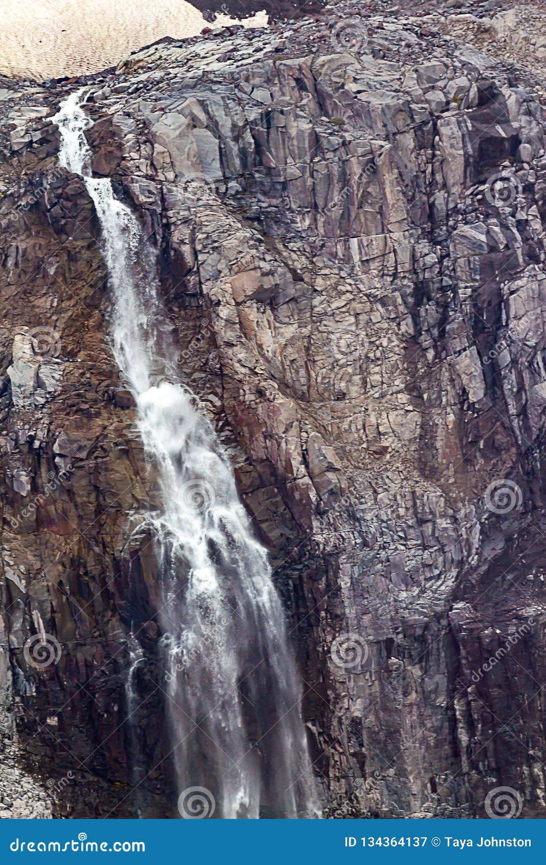 A Waterfall Over a Mount Rainier Cliff in Washington Stock Image ...