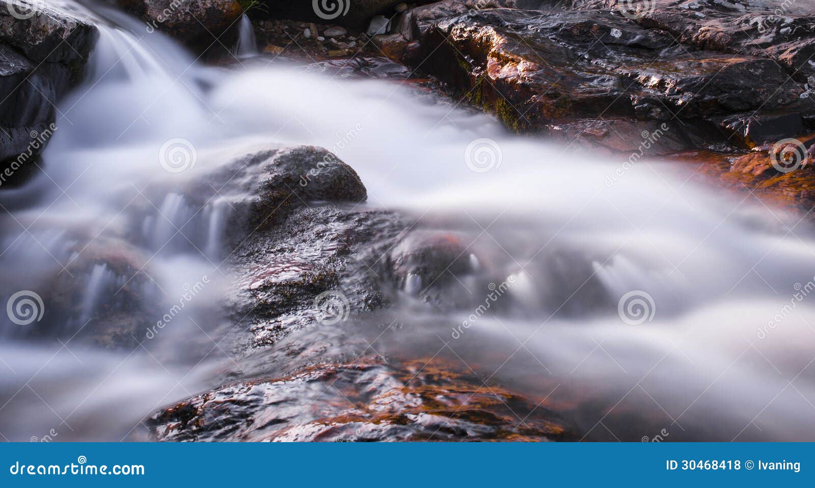 Waterfall over red rock stock photo. Image of three, silk - 30468418
