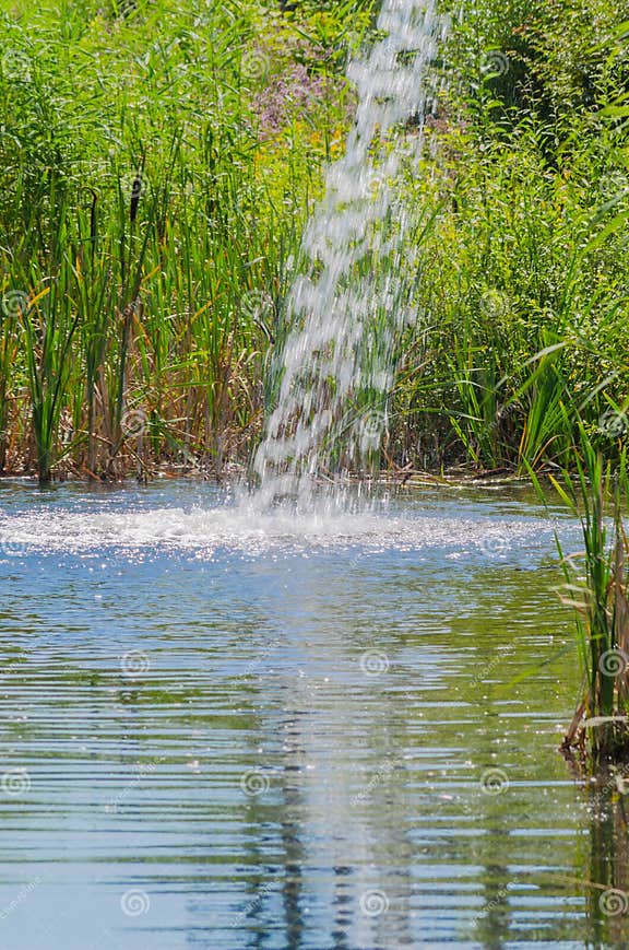 Waterfall from a pipe stock photo. Image of designed - 124927866