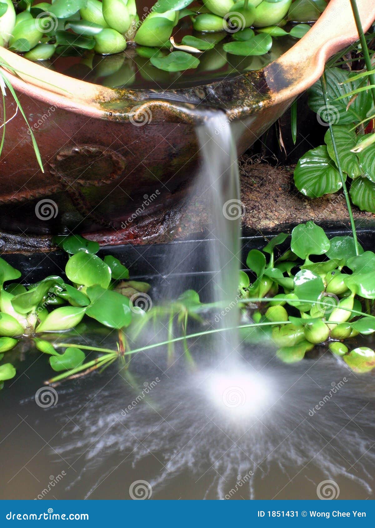 Waterfall pottery garden stock image. Image of water, decor - 1851431