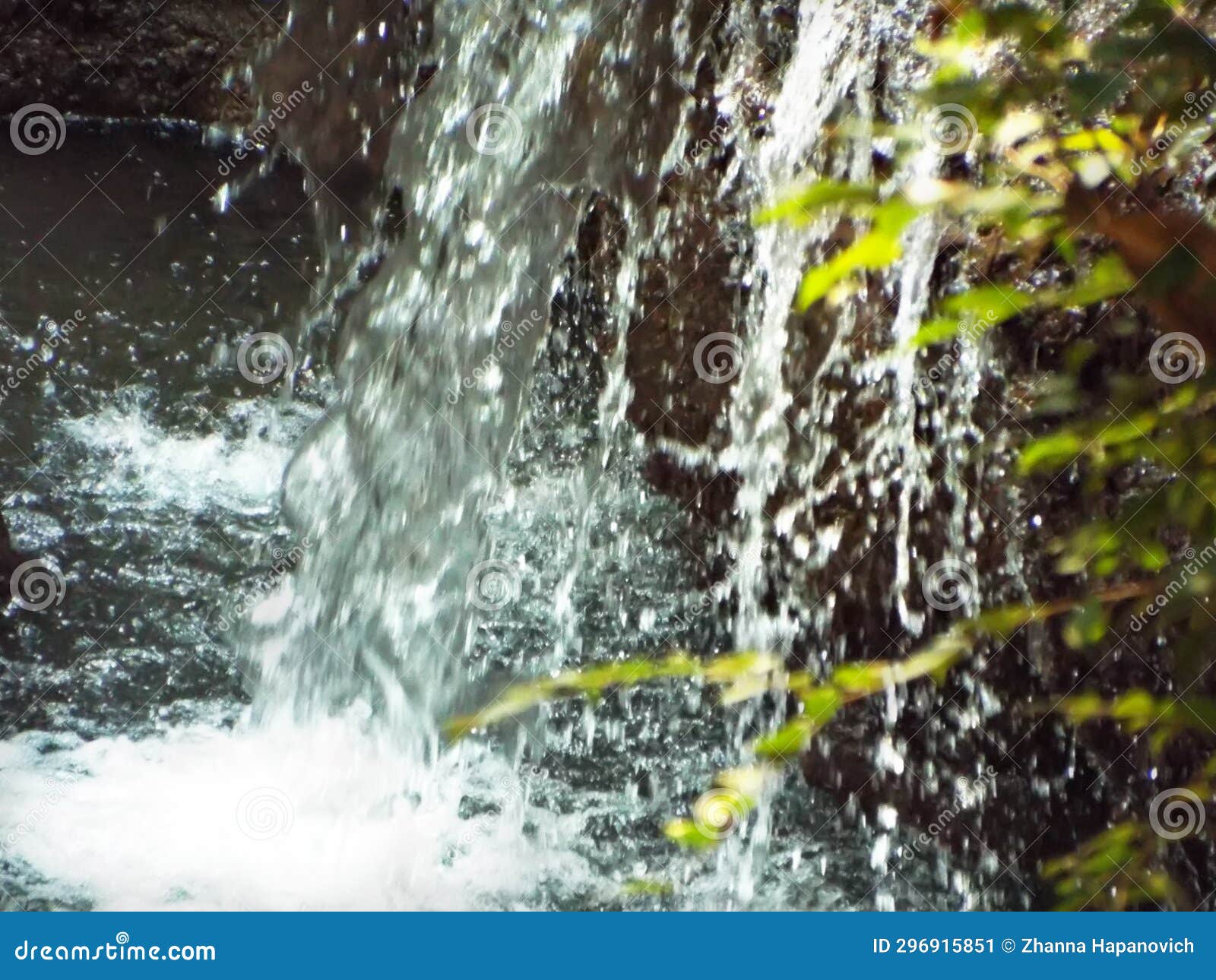 Waterfall Pouring into a Pond. Shiny Splashes Close Up Stock Image ...