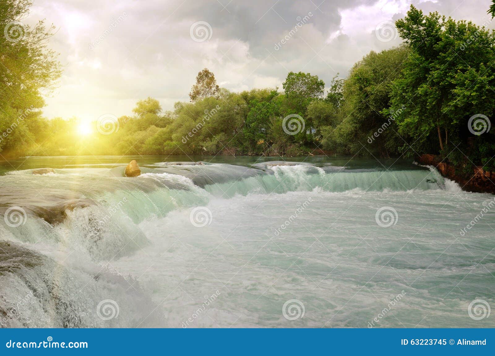 Waterfall on the river stock image. Image of environment - 63223745